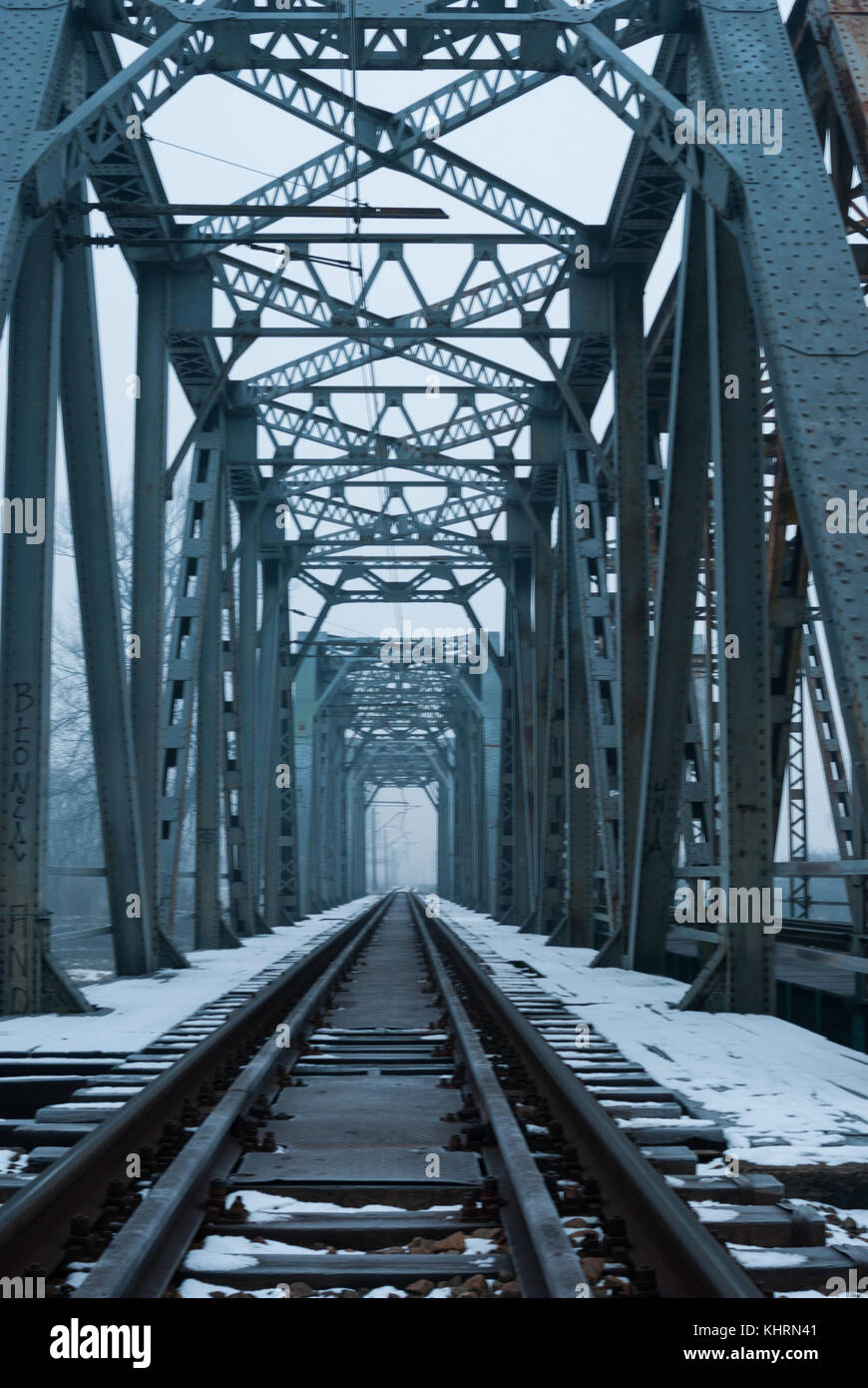 Railway bridge, metal structure covered with snow Stock Photo - Alamy
