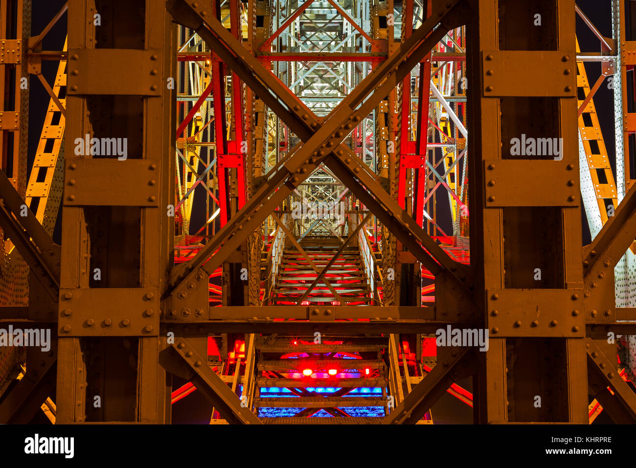 Steel bridge construction illuminated at night Stock Photo - Alamy