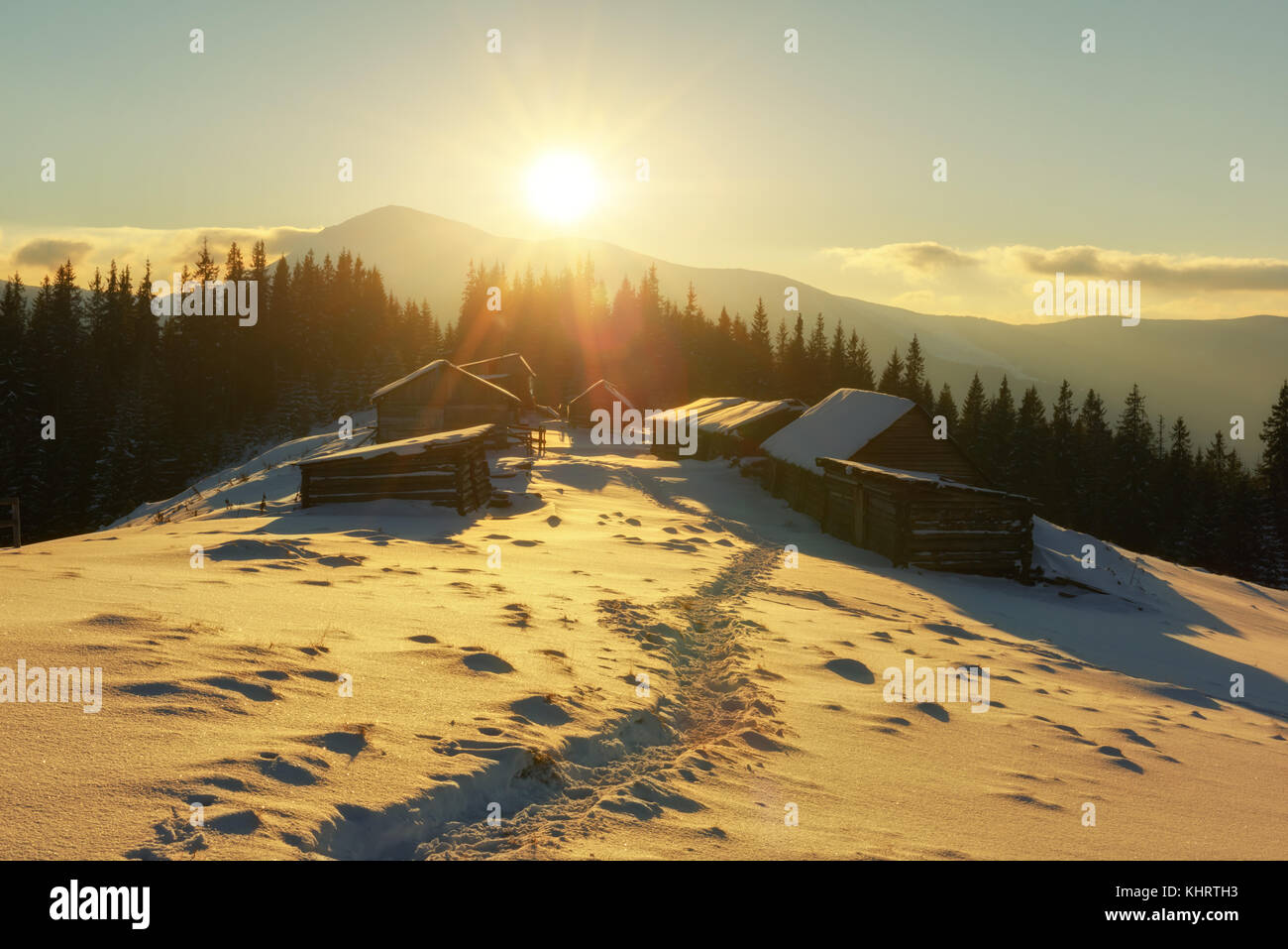 Fantastic landscape with snowy house Stock Photo - Alamy