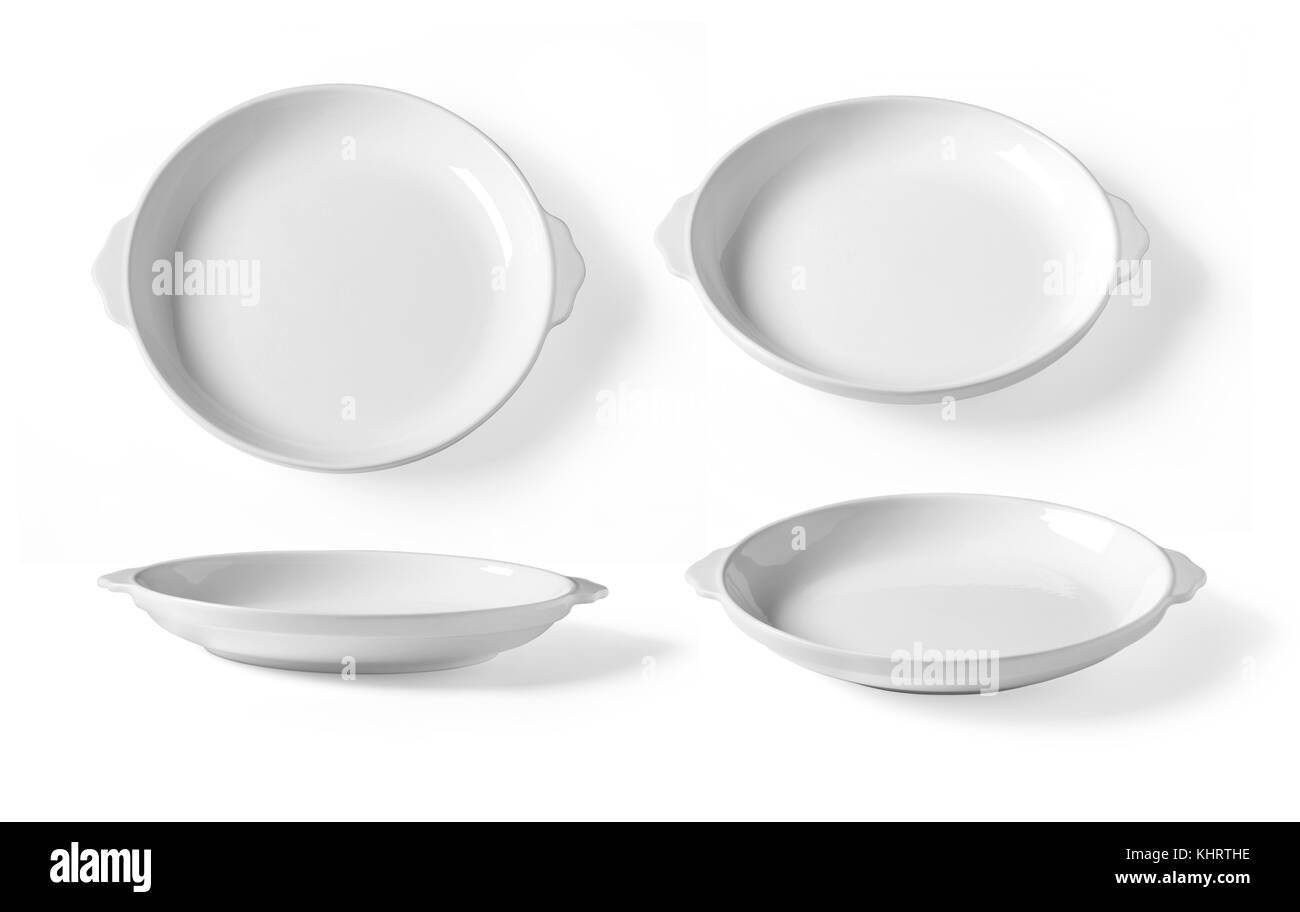set of four White plates on white background Stock Photo - Alamy