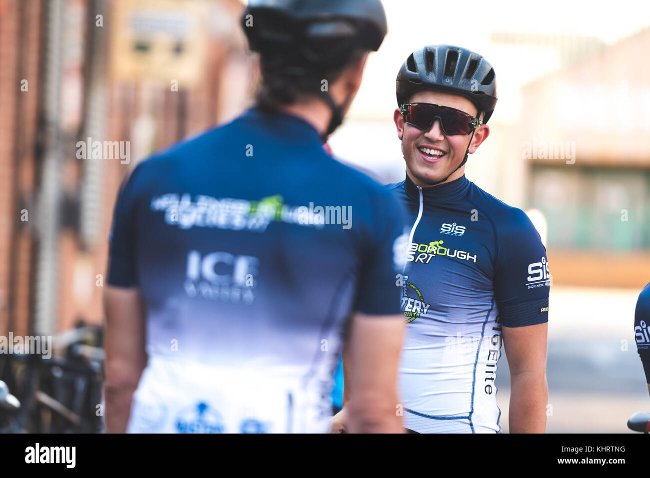 Casual photos of a race team after a long ride Stock Photo - Alamy