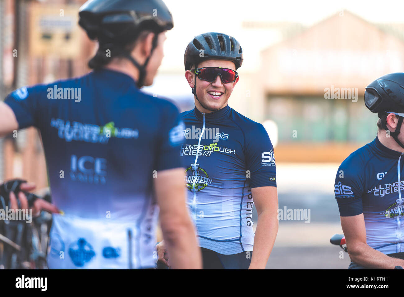 Casual photos of a race team after a long ride Stock Photo - Alamy