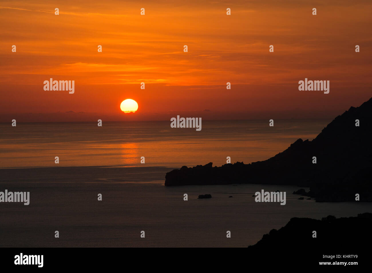 Sunset in the Libyan Sea seen from mountain village Myrhtios above ...