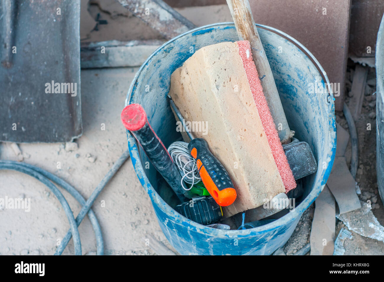 construction tools in a plastic bucket Stock Photo - Alamy