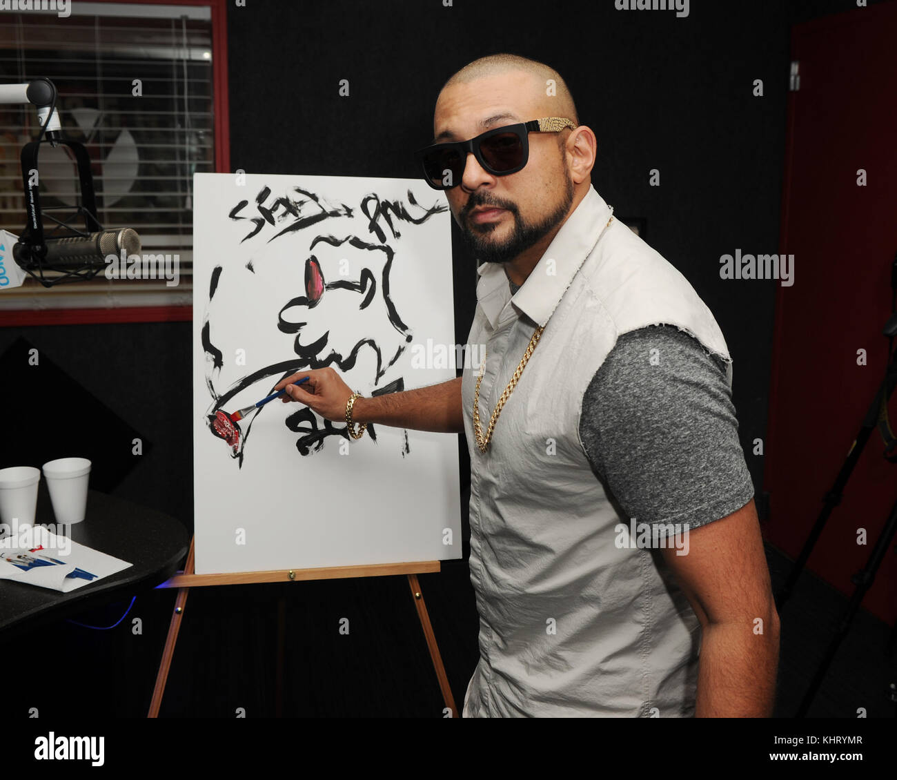 FORT LAUDERDALE, FL - JANUARY 27: Sean Paul shows off his painting ...