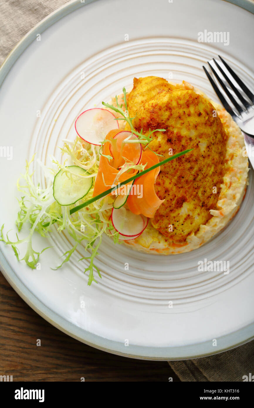 Chicken with stewed roots, food above Stock Photo - Alamy