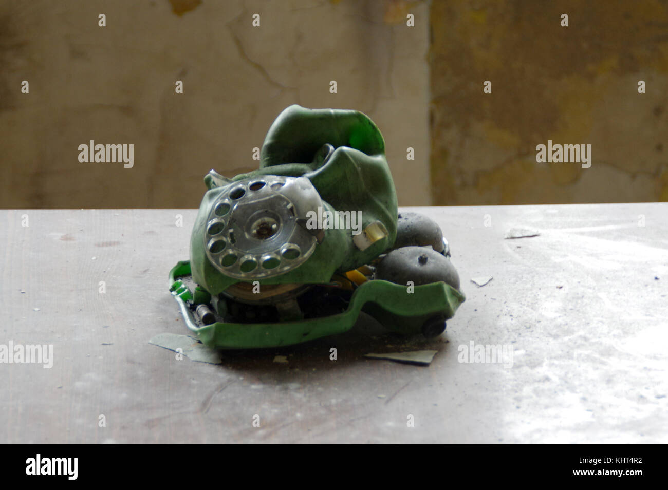 Old classic phone destroyed in fire. Burnt and melted plastic retro ...