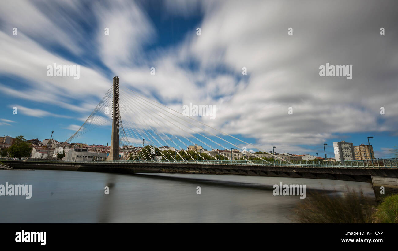 modern bridge over river in galicia Stock Photo - Alamy