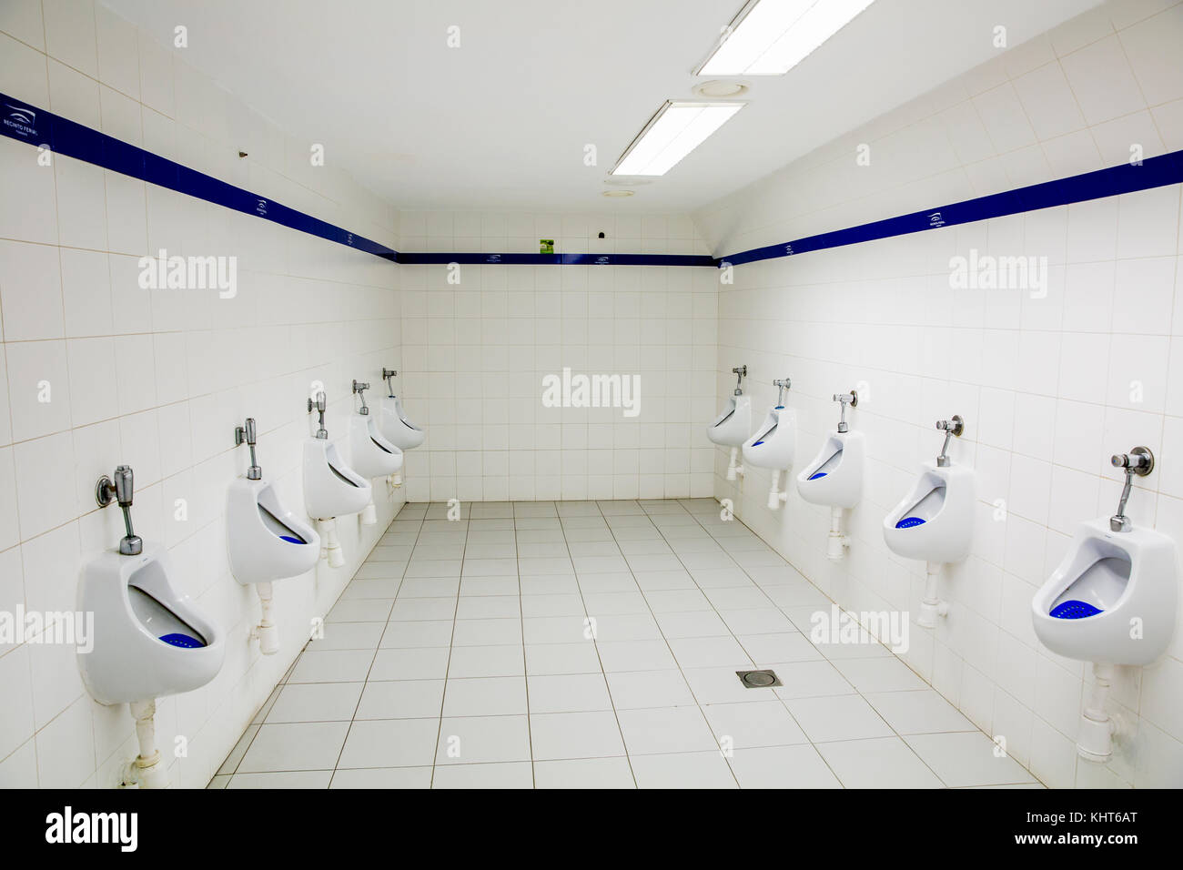 Gents lavatory urinals and tiled walls and floor Stock Photo - Alamy