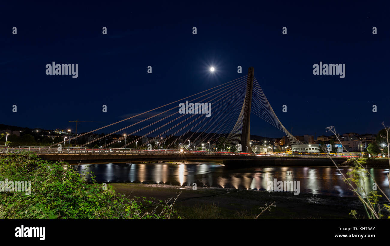modern bridge over river in galicia Stock Photo - Alamy