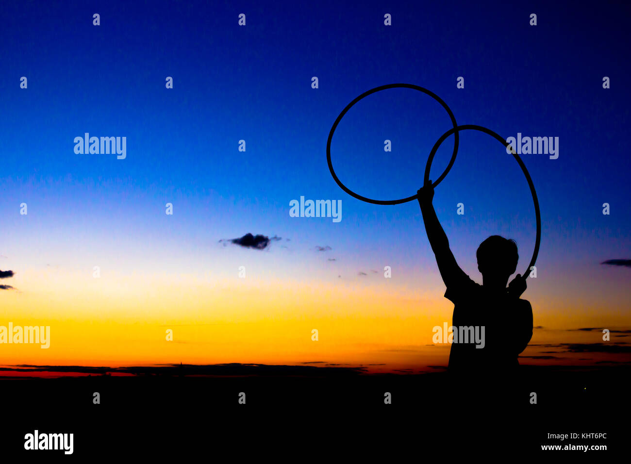 Hula hoops at sunset Stock Photo - Alamy