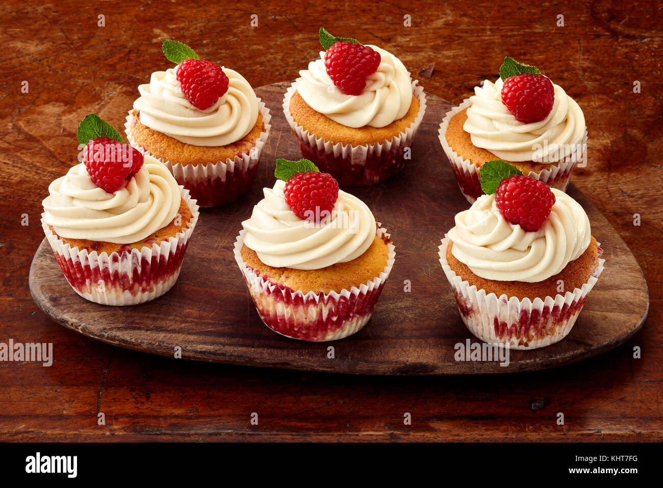Raspbery explosion cupcakes Stock Photo - Alamy