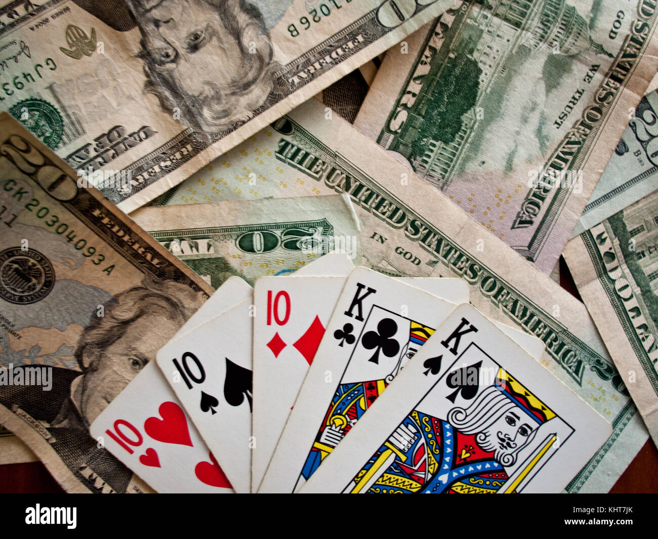 Winning hand gambling concept, full house Stock Photo - Alamy