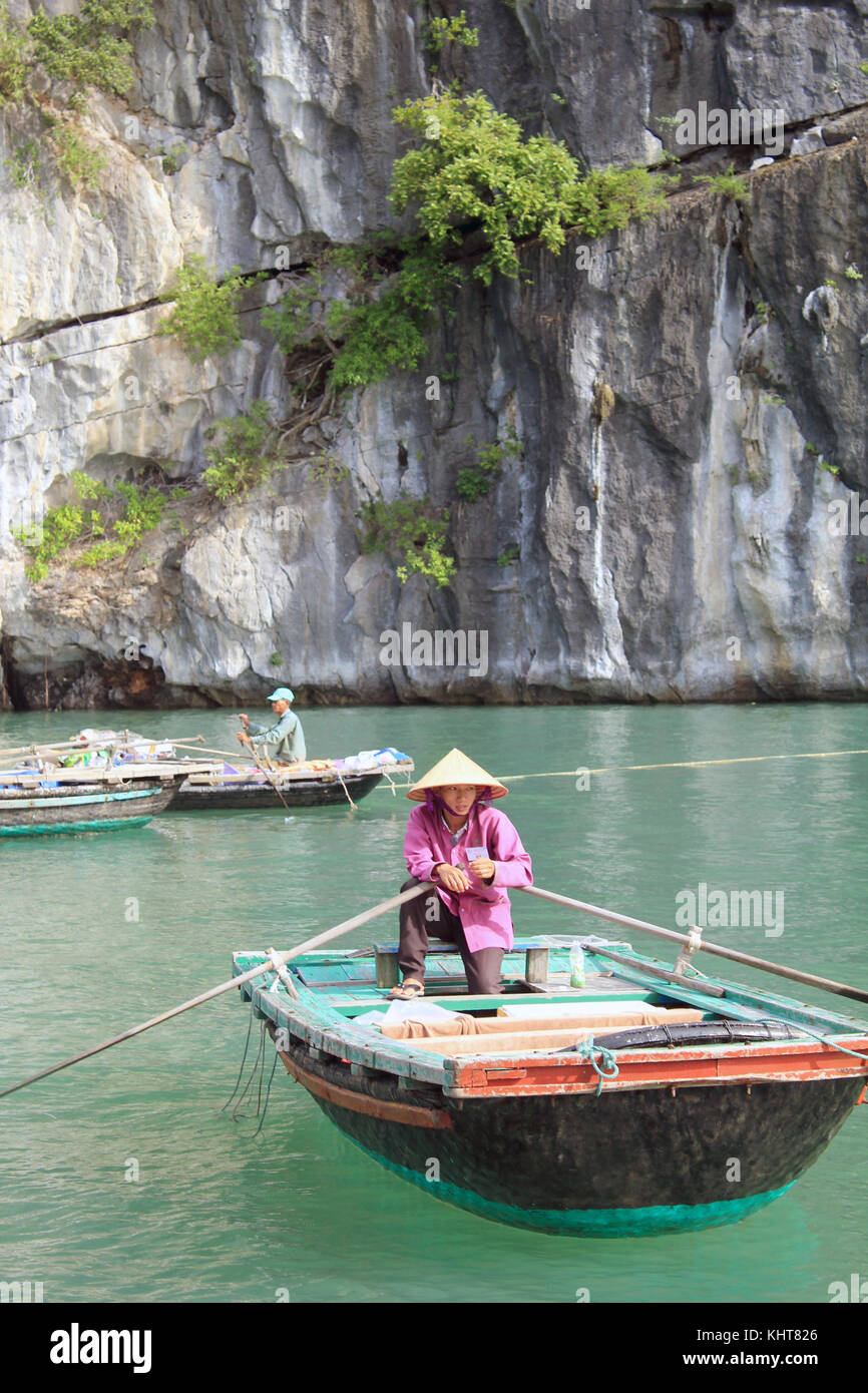 Vietnamese Tour Boat Guide Prepares to Welcome Visitors Stock Photo - Alamy