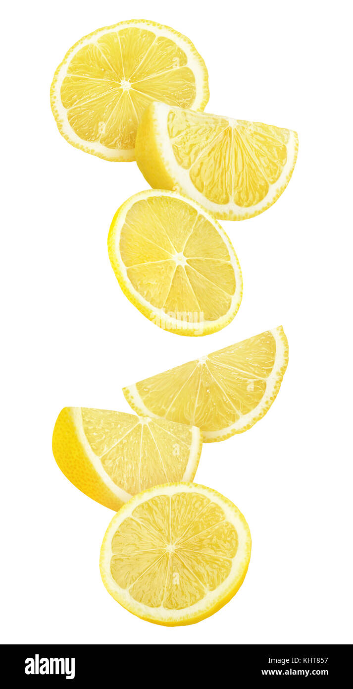Isolated lemon slices in the air. Cut lemon fruit falling isolated on white background with ...