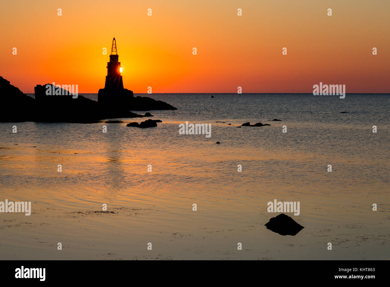 Sunrise in gold, the silhouette of the lighthouse near Ahtopol ...