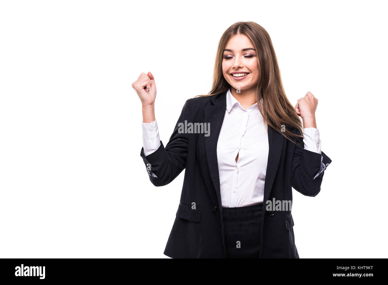 Successful business woman celebrating with arms up Stock Photo - Alamy