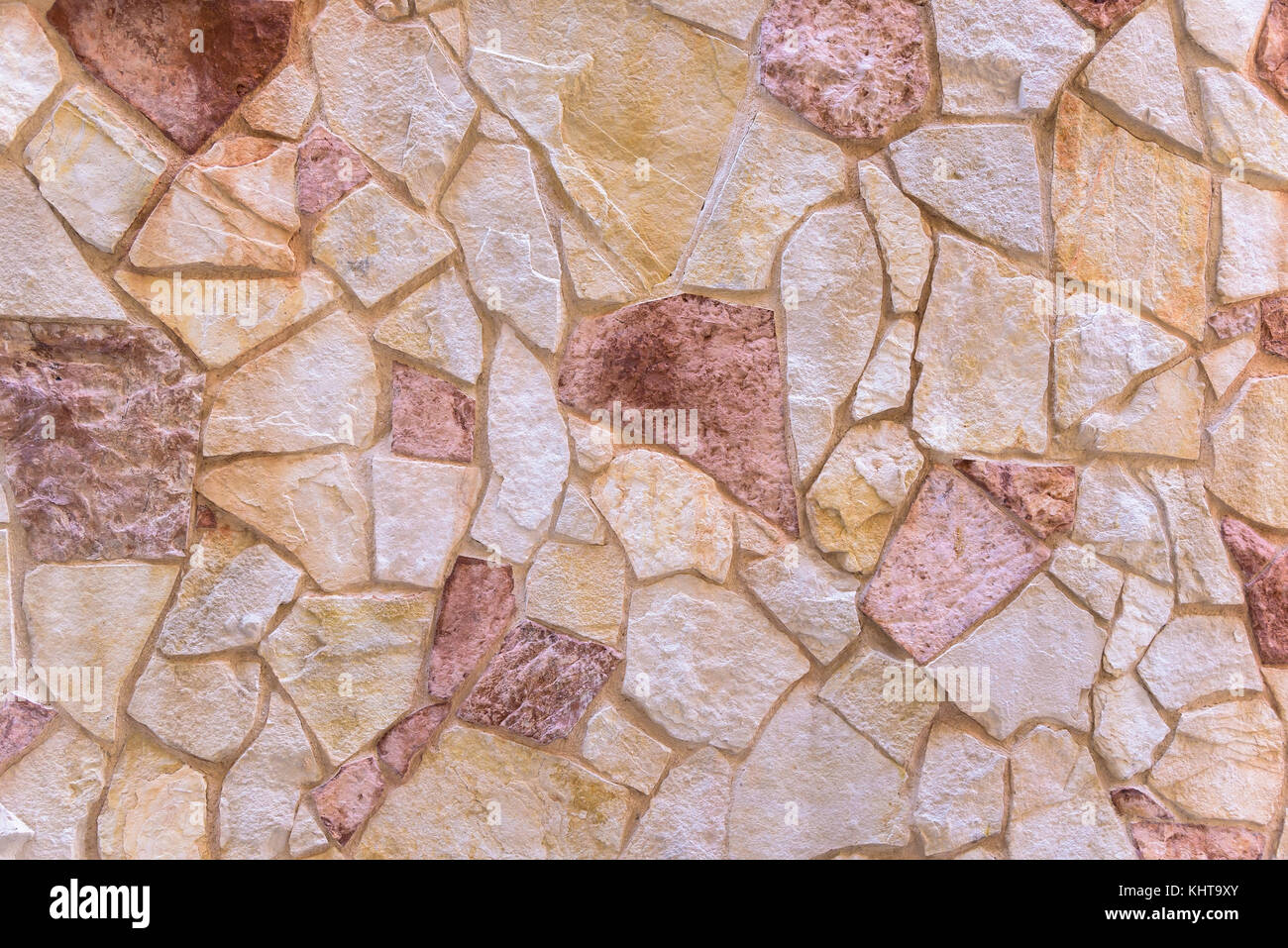 Background or texture made of red stone wall Stock Photo - Alamy