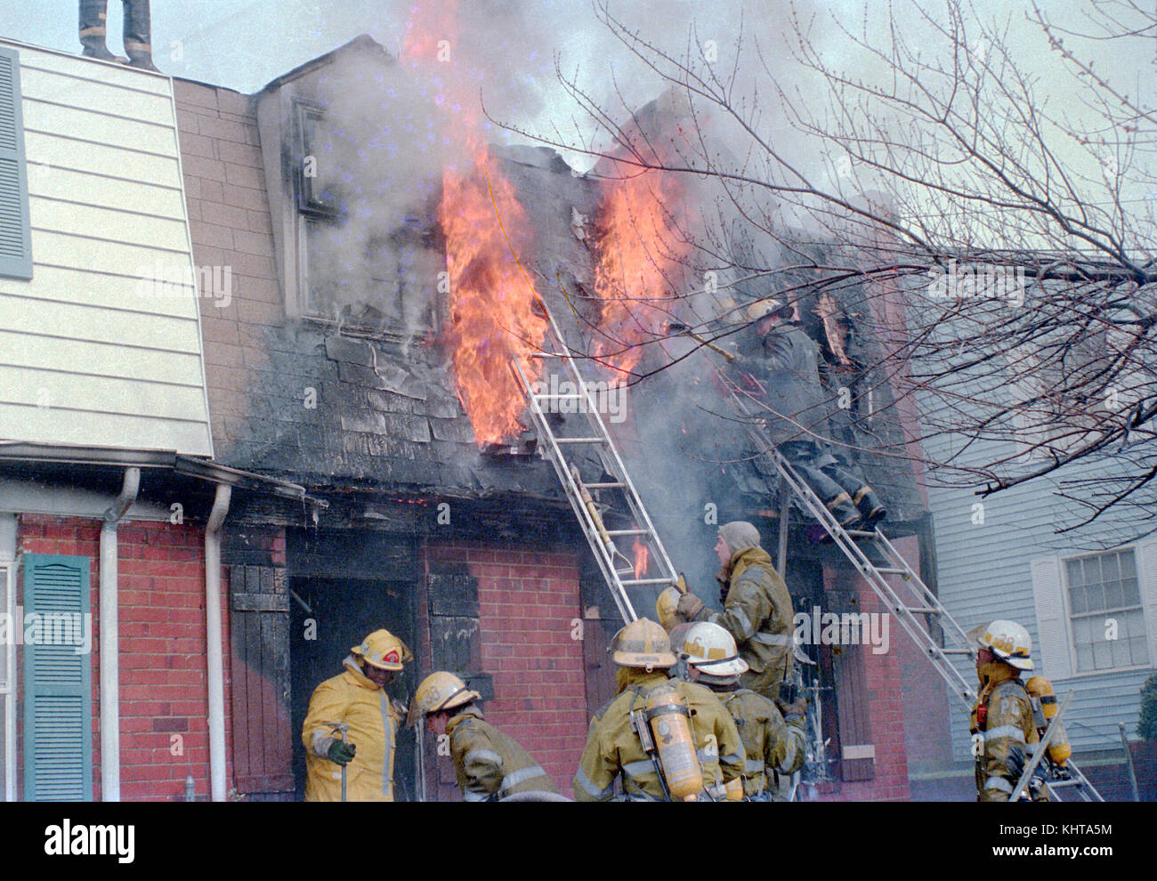 firefighters fight a house fire Stock Photo - Alamy