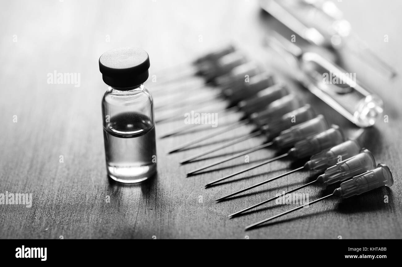 Ampoule and needles from a medical syringe Stock Photo - Alamy