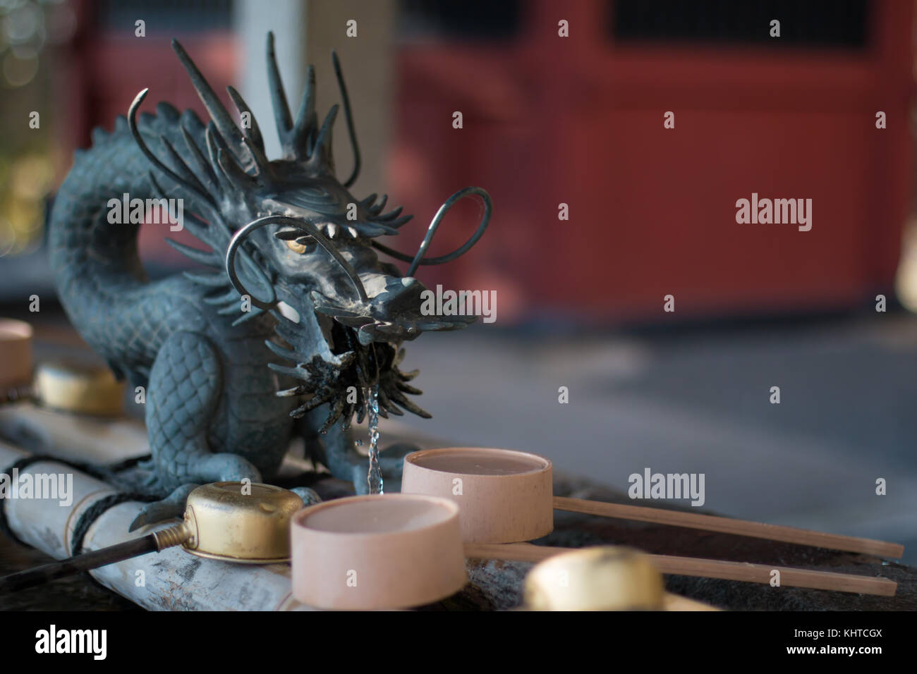 Dragon shaped tap at a japanese temple Stock Photo - Alamy