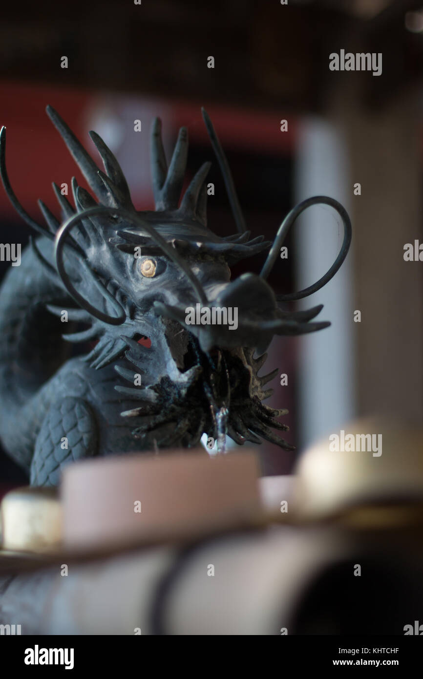Dragon shaped tap at a japanese temple Stock Photo - Alamy