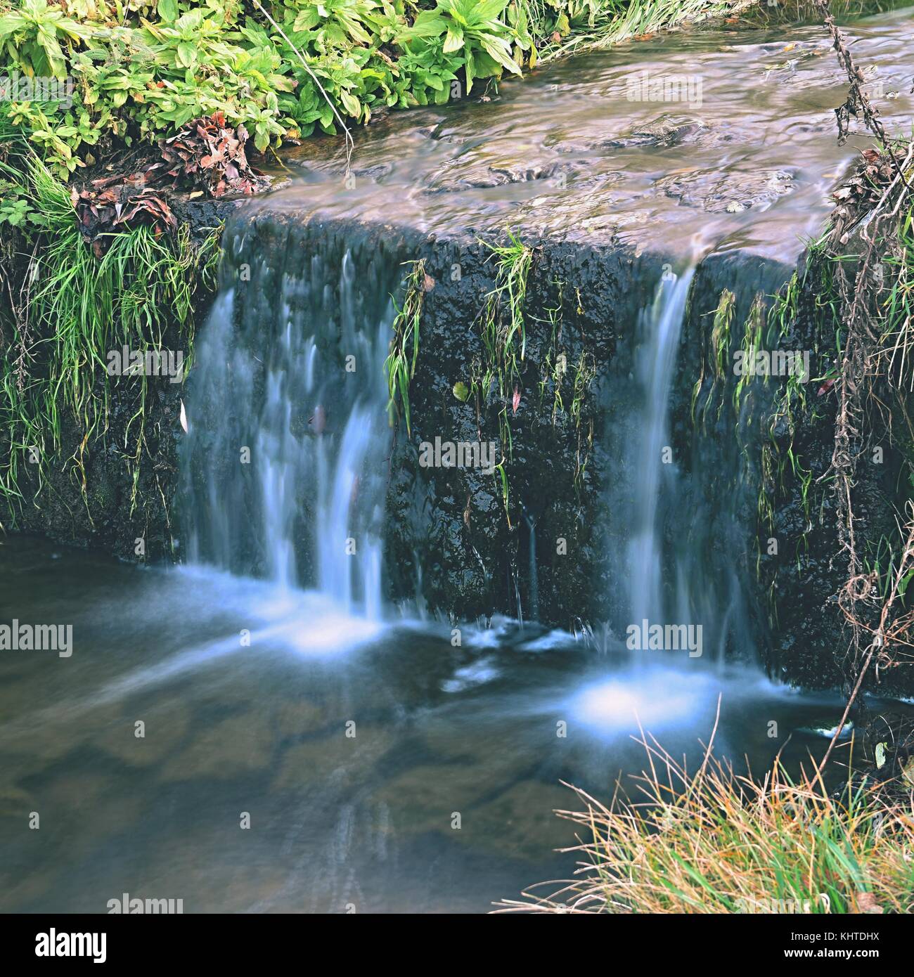A beautiful clean brook in the countryside with a sink and running ...