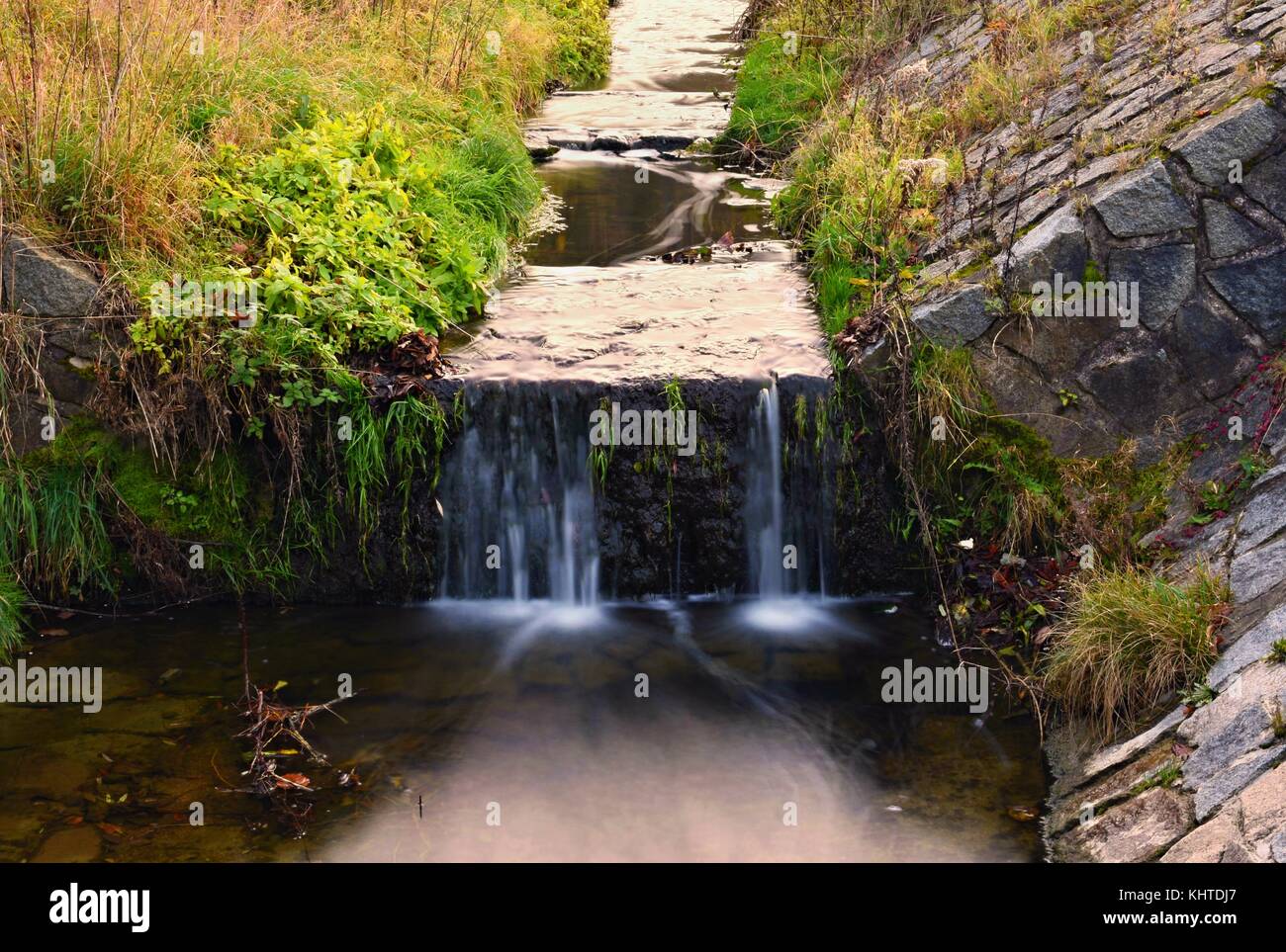 A beautiful clean brook in the countryside with a sink and running ...
