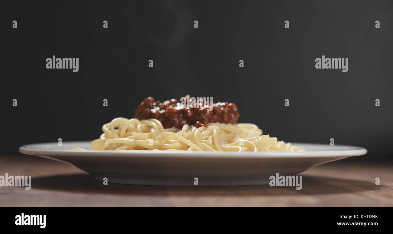 fresh hot spaghetti bolognese on table Stock Photo - Alamy