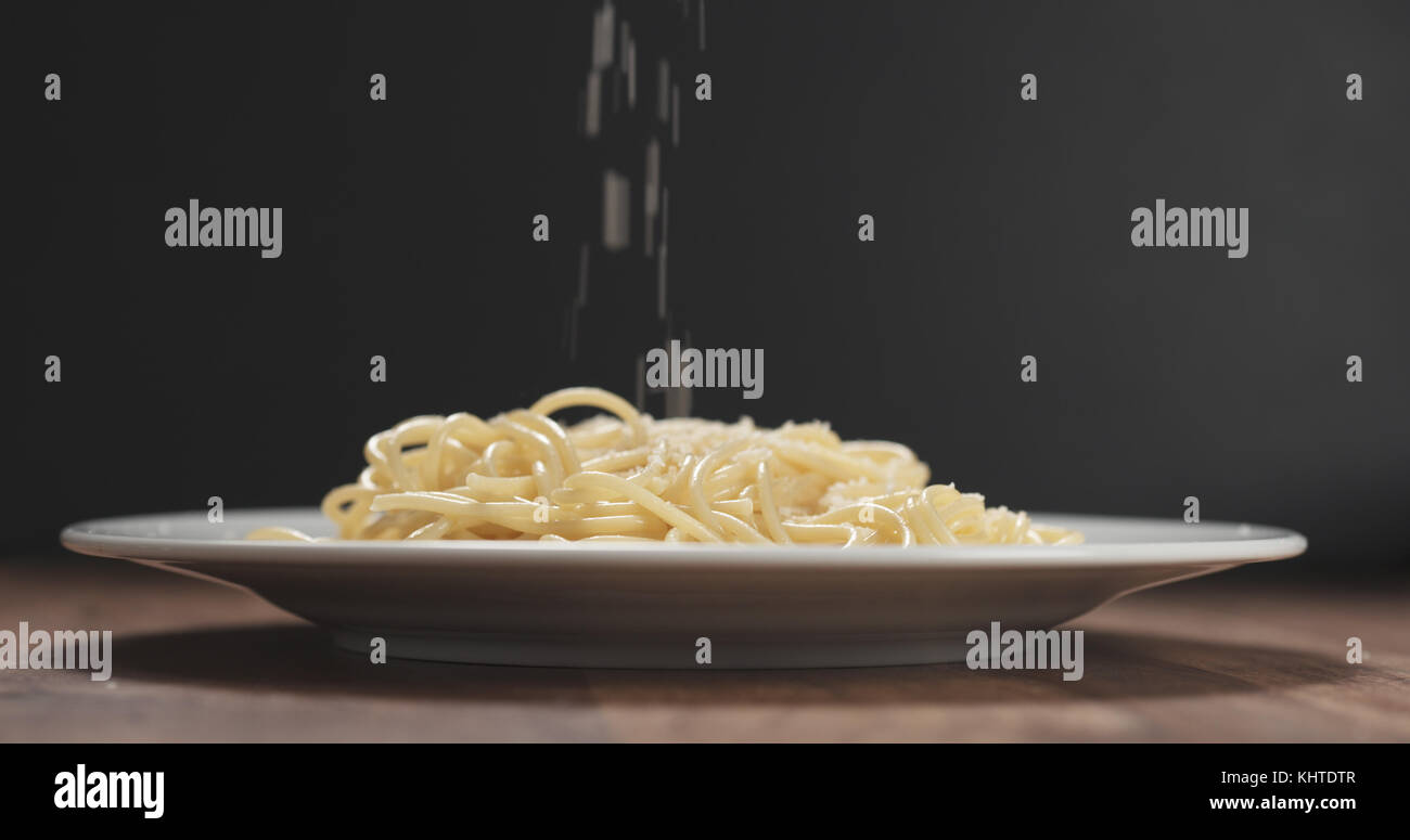 Grated parmesan cheese falling hi-res stock photography and images - Alamy