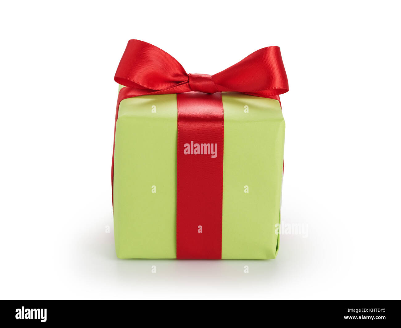 green gift box with red ribbon bow isolated on white Stock Photo - Alamy