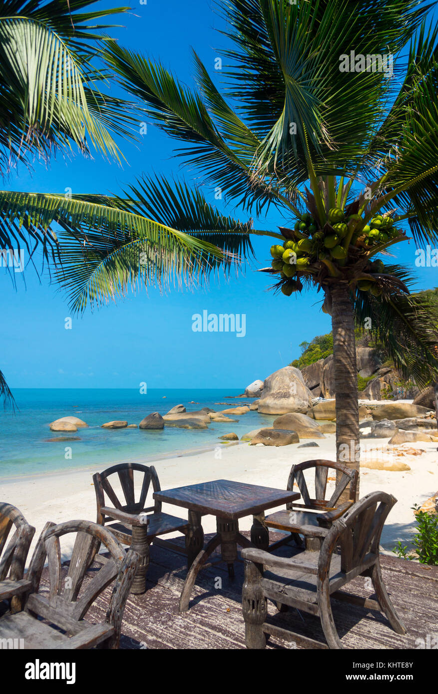 Table in a restaurant on the beach Stock Photo - Alamy