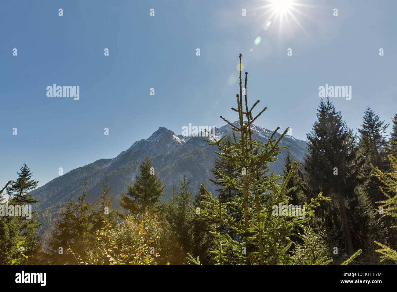 Bright sun over Alpine mountain landscape in Western Carinthia, Austria ...
