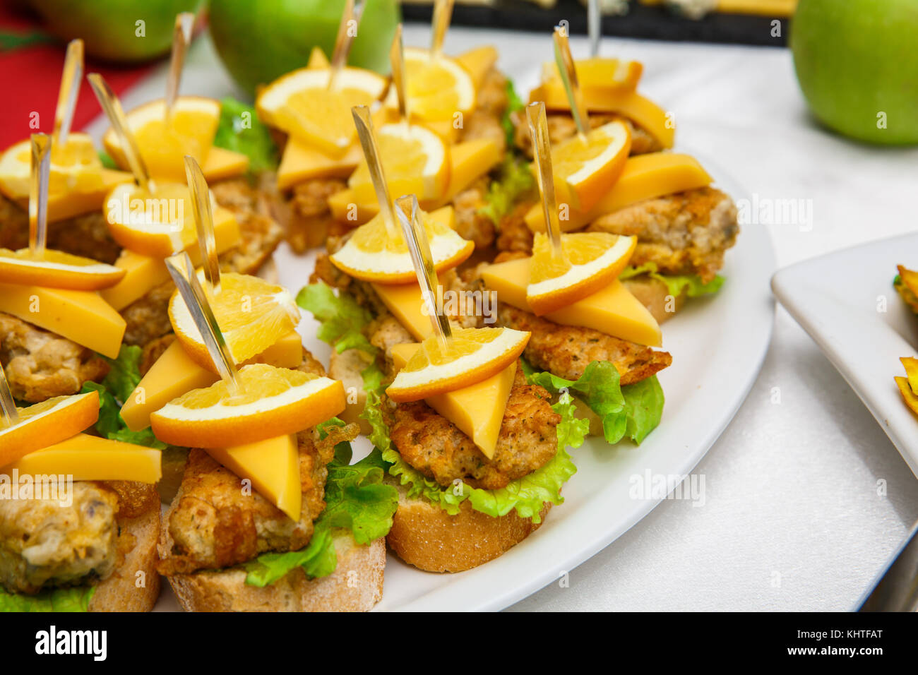 One plate with snacks on a buffet table. Selection of tasty bruschetta ...