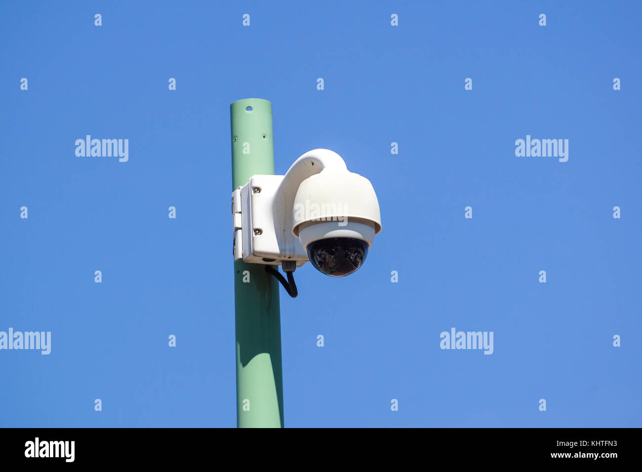 High tech overhead security camera with a blue sky Stock Photo - Alamy