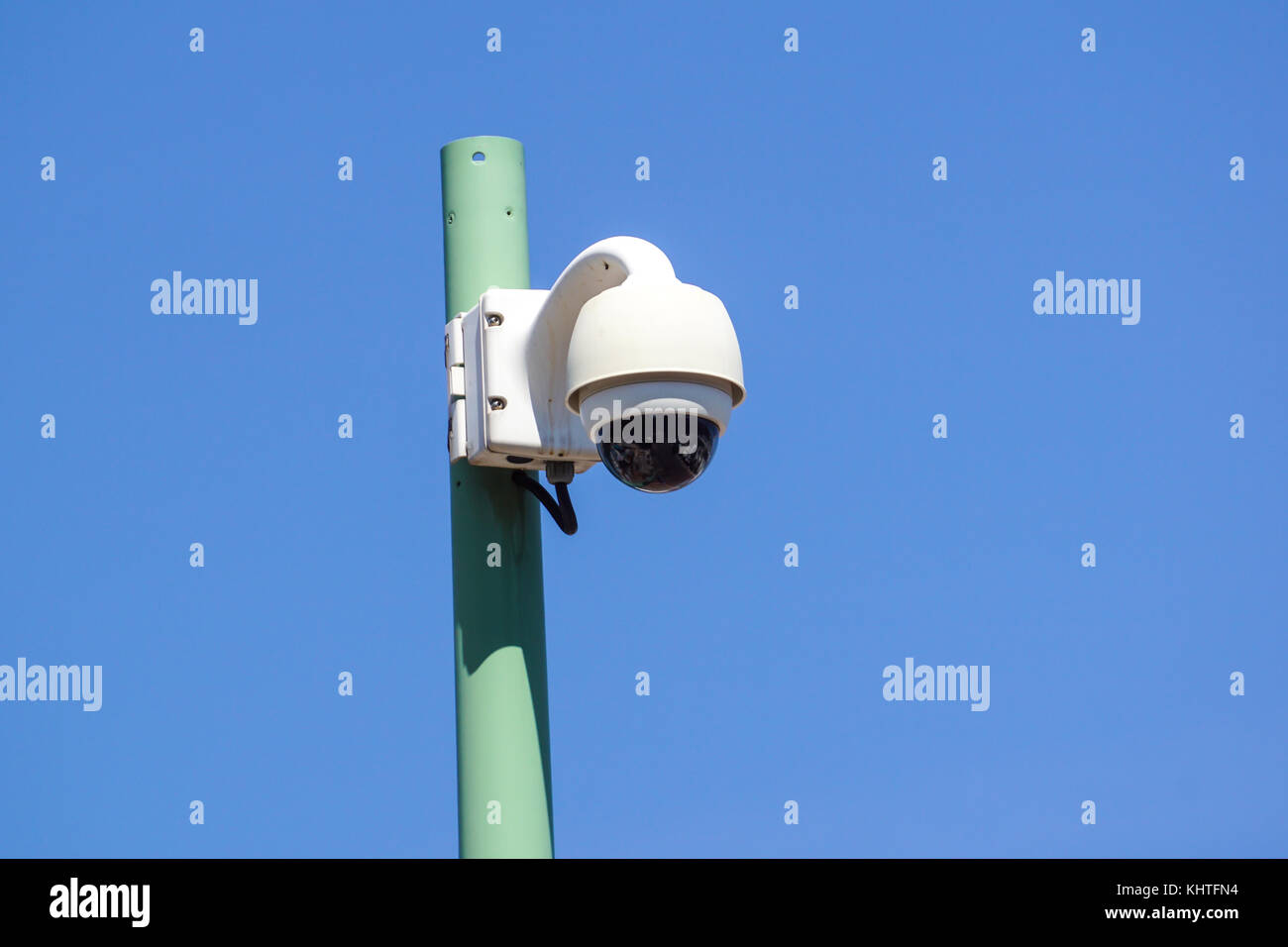 High tech overhead security camera with a blue sky Stock Photo - Alamy