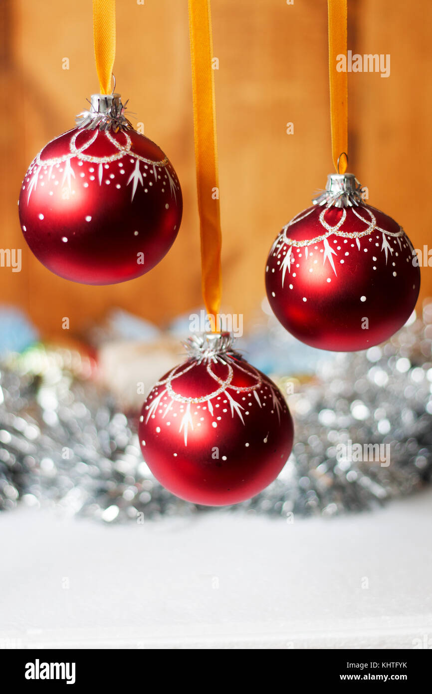 Shiny Christmas red ball hanging on pine branches with festive ...