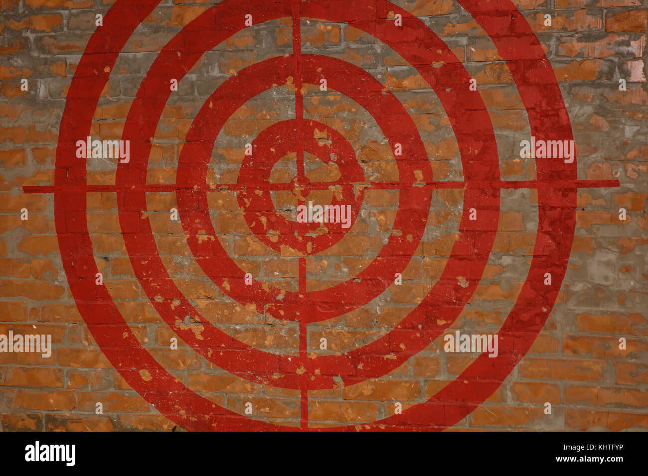 Red Target on the red brick wall. Graffiti Stock Photo - Alamy