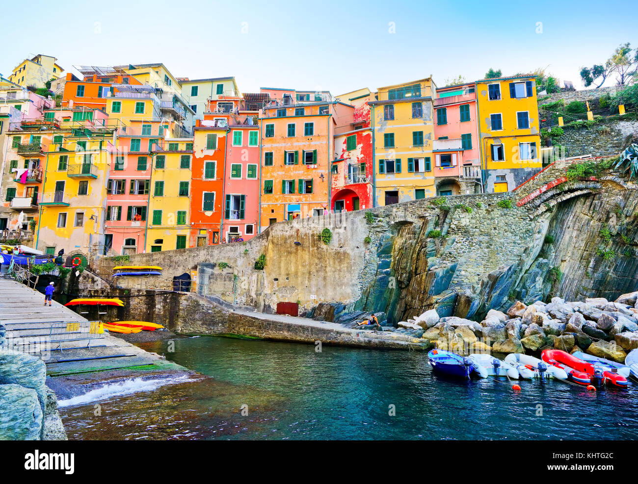 View of the colorful houses along the coastline of Cinque Terre area in Riomaggiore, Italy Stock ...