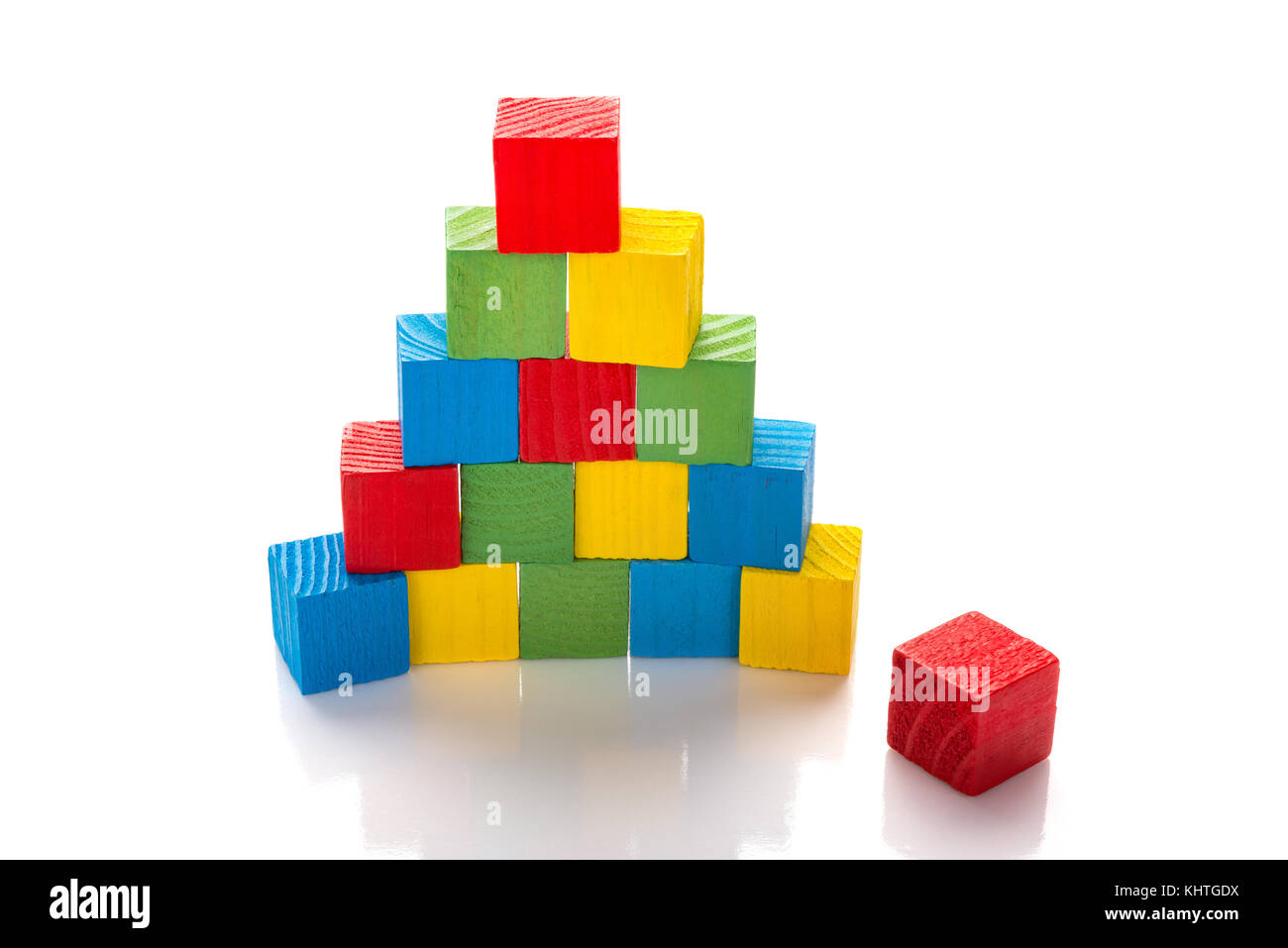 colorful wooden toy blocks stack up on a white background Stock Photo ...