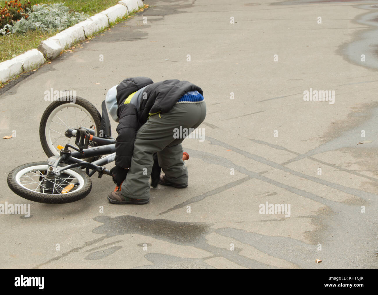 Boy fell of his bike hi-res stock photography and images - Alamy