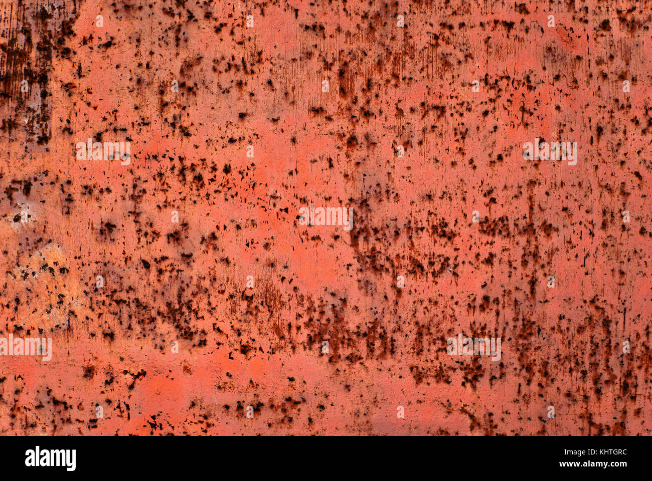 background, texture: surface of primed metal plate with rust spots and ...