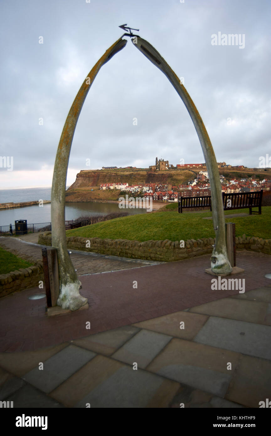 Whitby coastline with view of Whitby Abbey through whalebone arch ...
