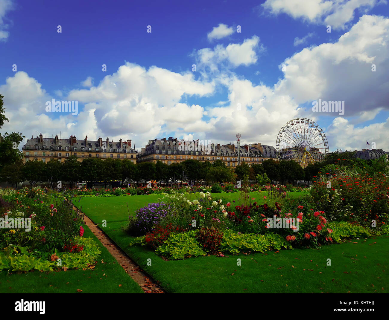 Summer Tuileries garden in front of Louvre palace in Paris, France ...
