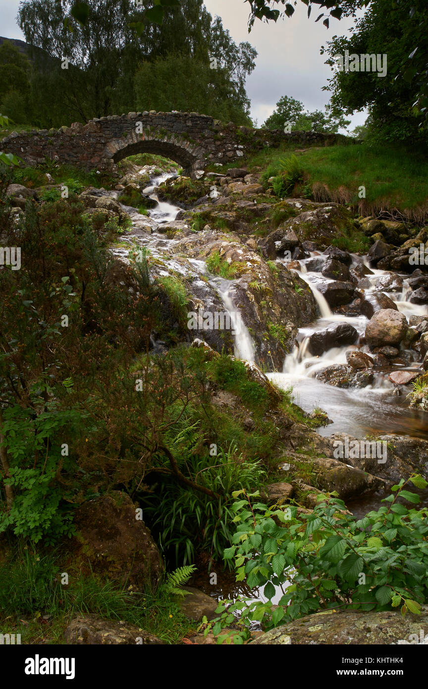 Scenic view of Ashness bridge crossing barrow beck, Borrowdale, Lake ...