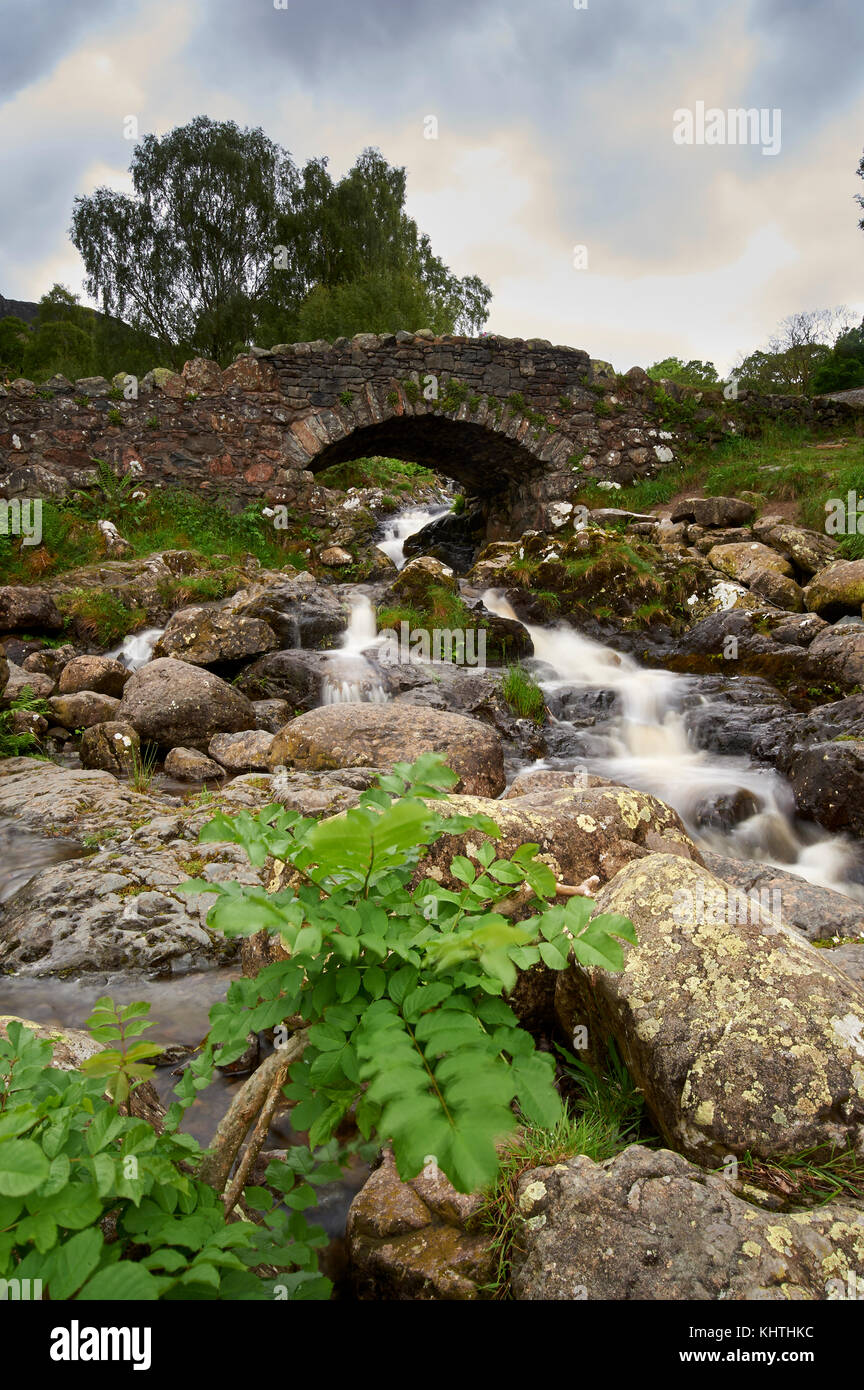 Scenic view of Ashness bridge crossing barrow beck, Borrowdale, Lake ...