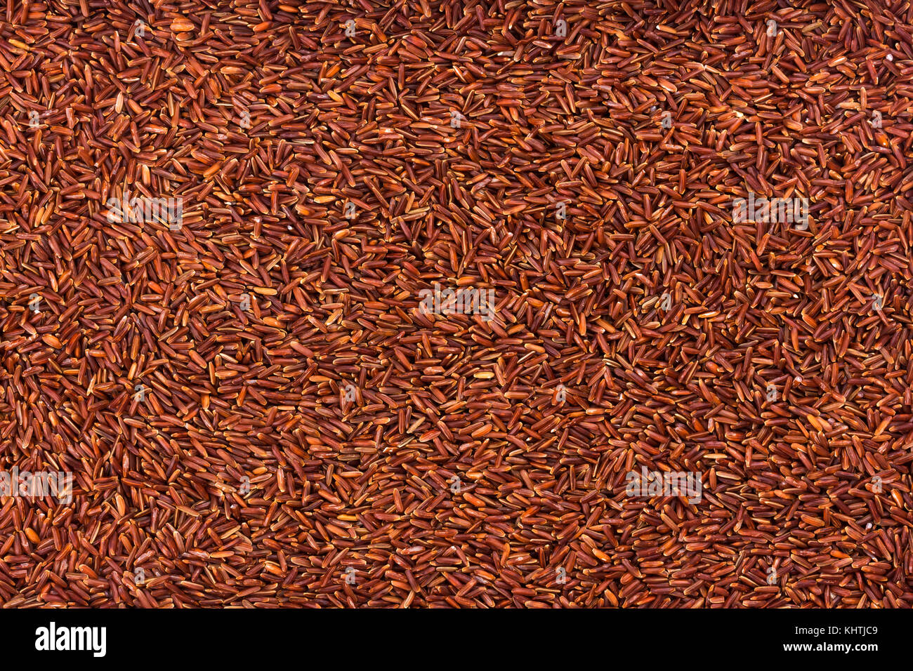 Red rice background Stock Photo - Alamy
