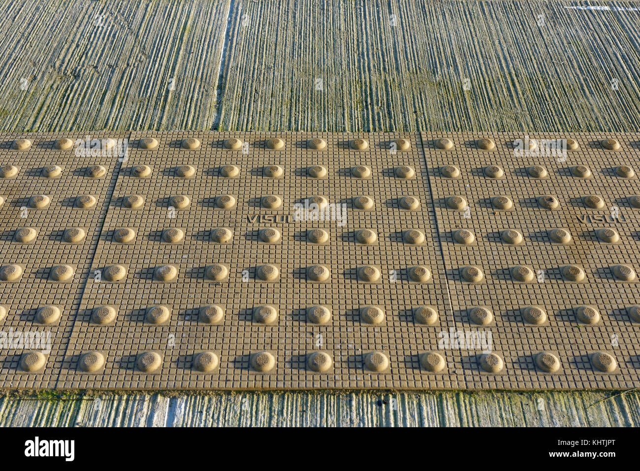 Platform edge tactile warning surface for blind and partially sighted ...