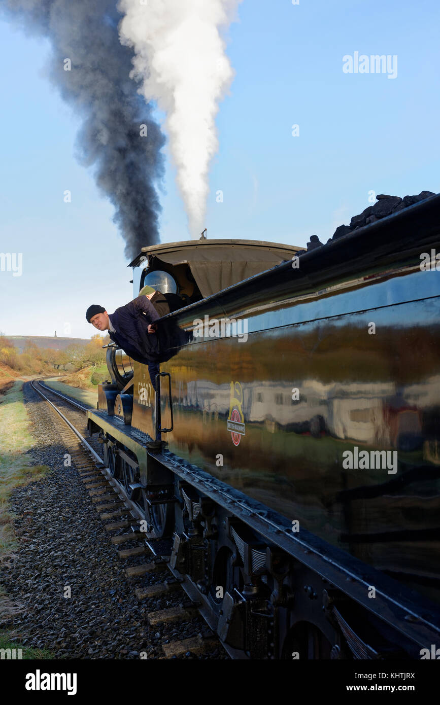 Black steam train, 0 6 0 locomotive waiting to depart from burrs ...