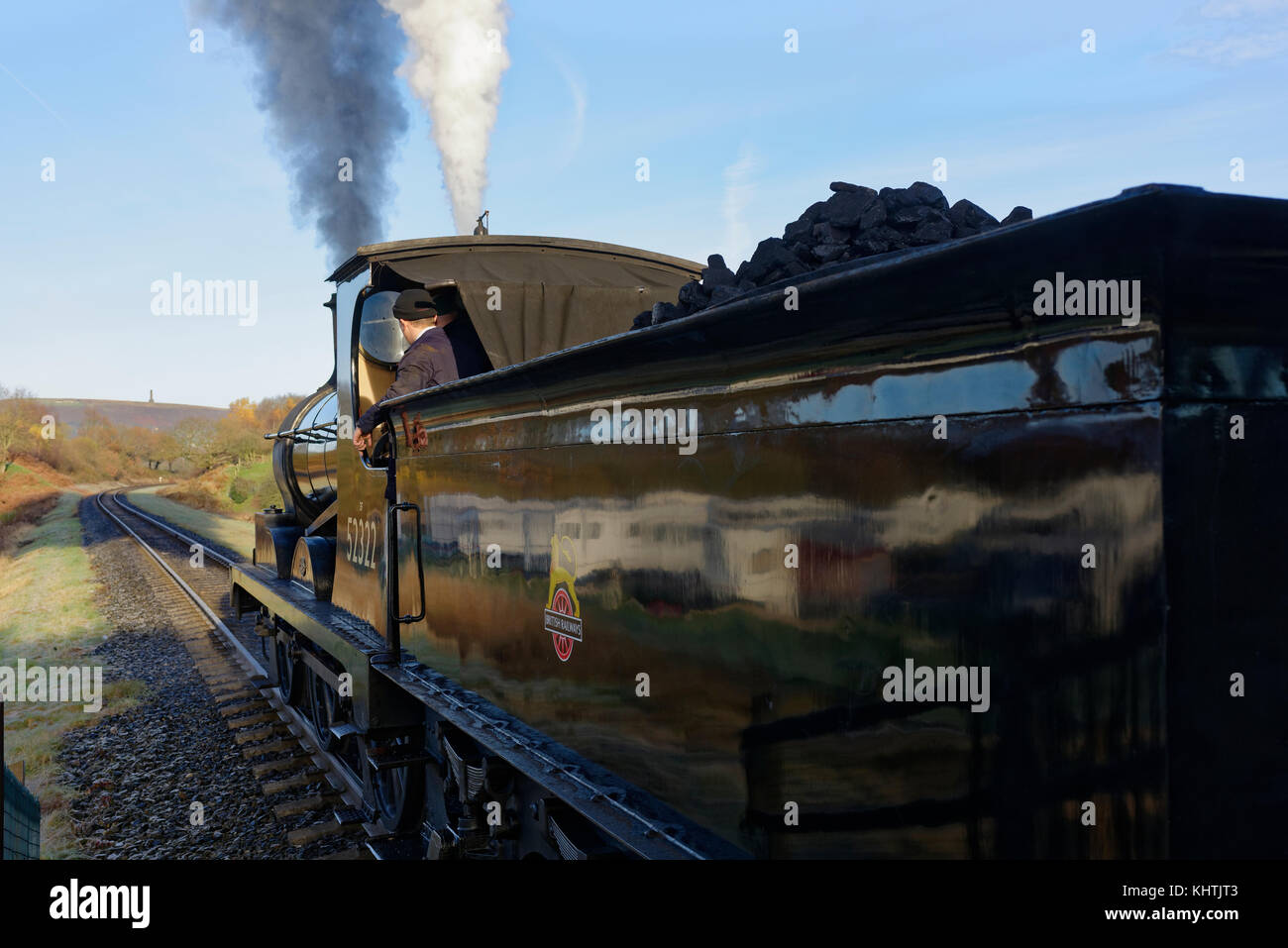 Black steam locomotive waiting to depart from burrs country park ...